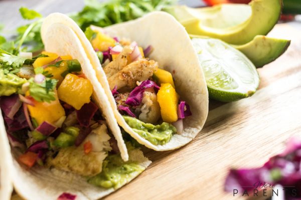 Grilled Fish Tacos with Mango Salsa & Avocado Lime Sauce - We're Parents
